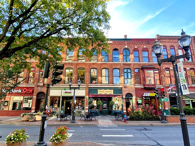 The varied facades of Oneonta's main street buildings create a visual rhythm that's both pleasing and full of character.