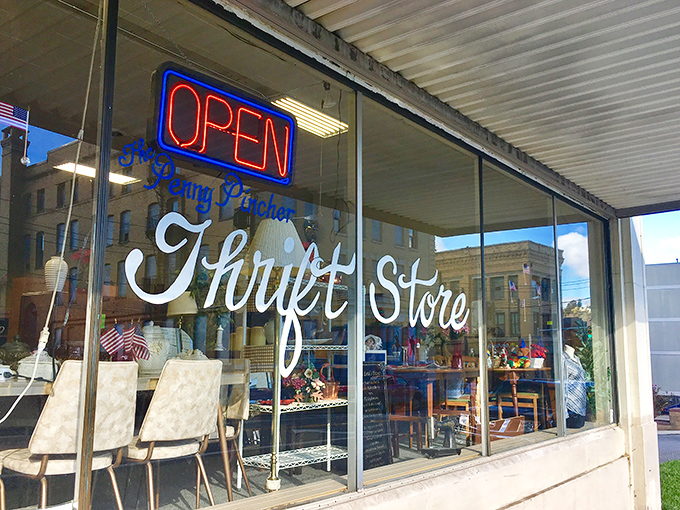 The "OPEN" sign glows like a beacon for bargain hunters&mdash;promising adventures in affordability behind that glass door.