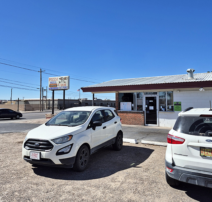 No-nonsense pizza headquarters with a side of small-town charm. This little building has satisfied more cravings than it lets on.
