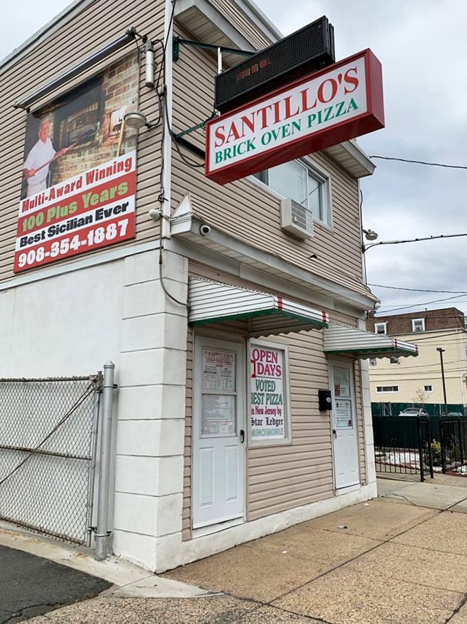 That humble doorway is actually a portal to pizza paradise &ndash; where Santillo's brick oven works its century-old magic.