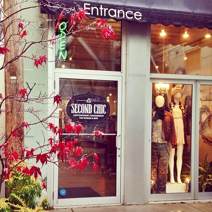 Red maple leaves frame this boutique entrance, promising seasonal fashion without the seasonal prices.