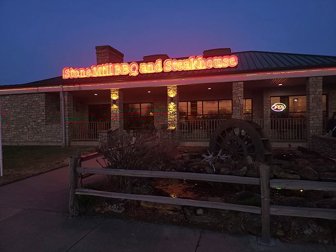 When the sun sets, Stone Mill's sign glows like a barbecue-scented North Star. Pizza and BBQ under one roof? That's Oklahoma ingenuity.