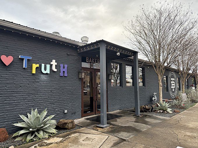 Houston's temple of smoke sports a modern look with vintage soul. Truth's exterior promises no barbecue lies inside.