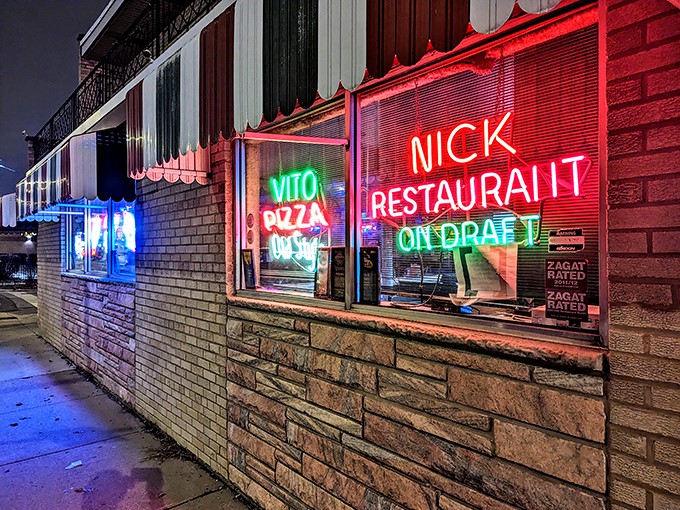 Those neon signs in the window aren't just decoration&mdash;they're beacons guiding pizza pilgrims to thin-crust nirvana.