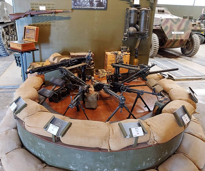 This impressive display of historic machine guns offers visitors a glimpse into the evolution of battlefield technology through the decades.