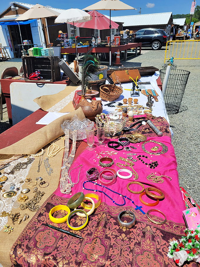Jewelry displays transform ordinary folding tables into dazzling boutiques, where bangles and beads catch the sunlight and shoppers' attention equally.