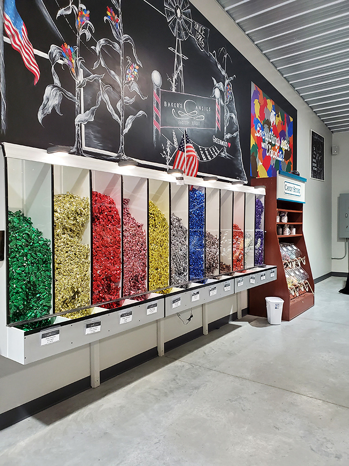 A wall of wrapped wonders! Colorful foil-covered chocolates create an artistic display that's almost too pretty to disturb. Almost.