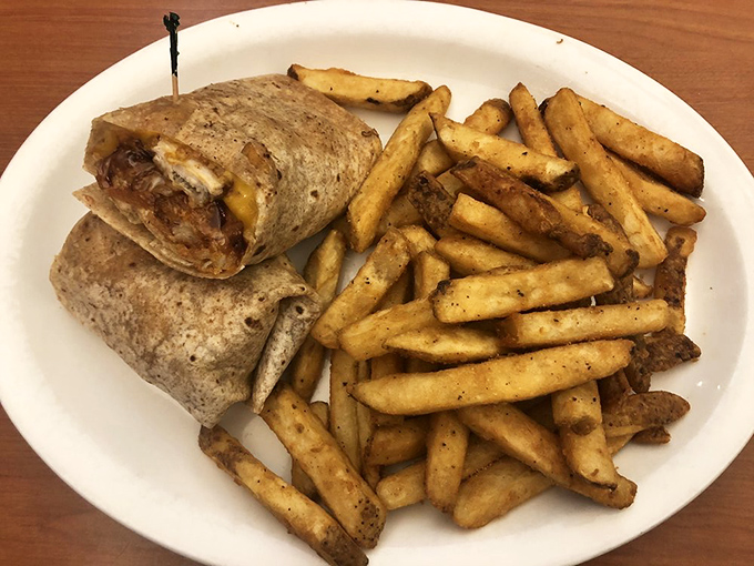 A wrap so perfectly executed it deserves its own victory lap&mdash;crispy fries standing at attention alongside like delicious soldiers of satisfaction.