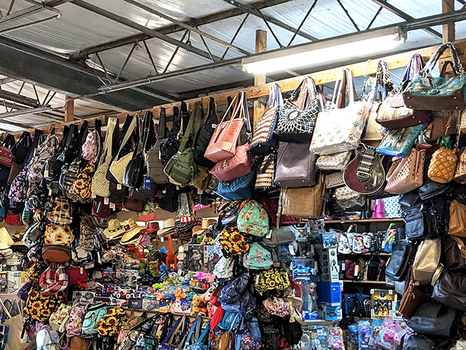 Handbag heaven! This kaleidoscope of purses dangles like fashionable fruit, tempting shoppers with the promise of the perfect accessory match.