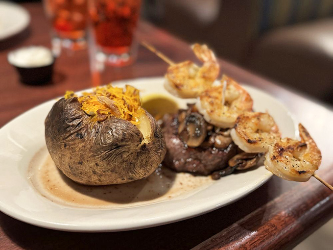 The loaded baked potato, nature's edible bowl. This beauty comes stuffed with enough toppings to qualify as its own food group.