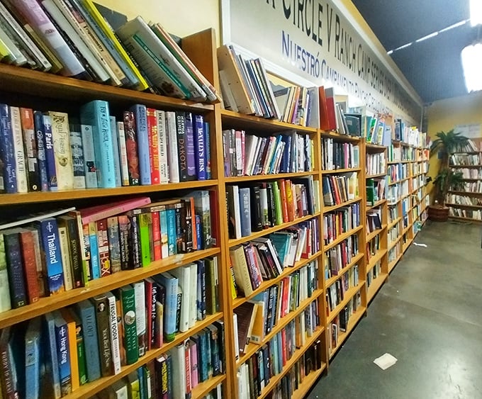 Literary treasures line wooden shelves, offering paperback adventures and hardcover wisdom for less than the cost of a fancy coffee.