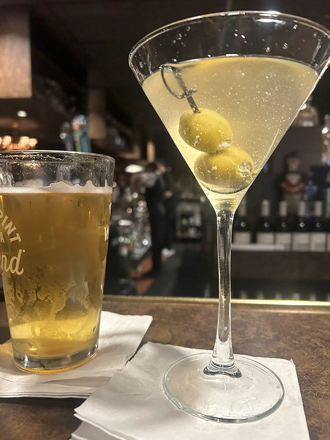 The perfect pairing: a cold beer for honesty, a dirty martini for secrets. At The Paragon's bar, both are served with equal respect.