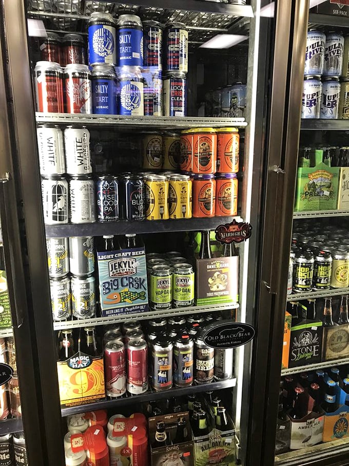The beer selection rivals many dedicated bars. These refrigerated cases hold liquid treasures from around the world, proving diplomacy extends to beverages too.