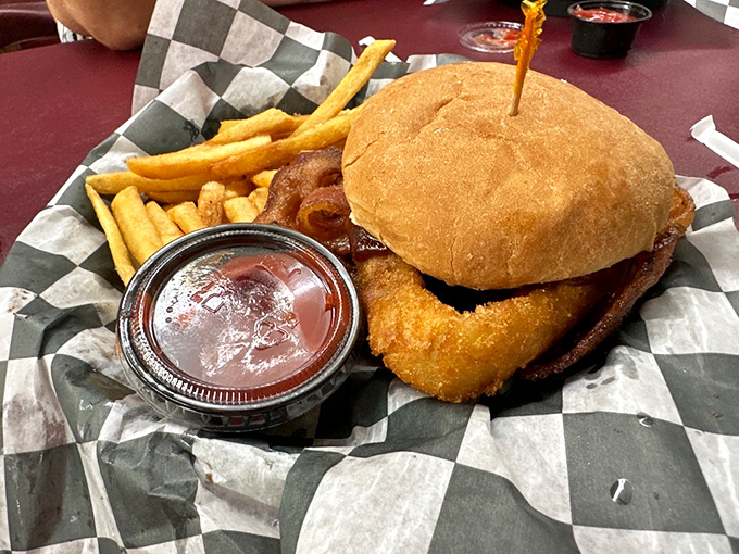 The Big Tex burger doesn't just satisfy hunger&mdash;it obliterates it with bacon, onion rings, and BBQ sauce in perfect harmony.