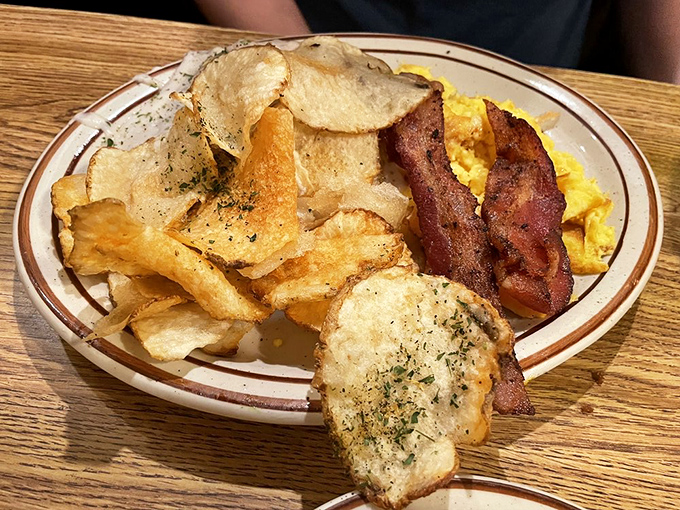 Bacon performing its supporting role with Oscar-worthy perfection alongside eggs scrambled just right &ndash; breakfast's dynamic duo never disappoints.