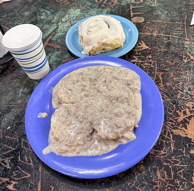 Biscuits swimming in creamy sausage gravy &ndash; Southern comfort food that makes you want to adopt a drawl for the rest of the day. 