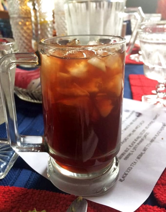 The humble mug of iced tea becomes something special here&mdash;a companion to conversation in a place where time slows down.