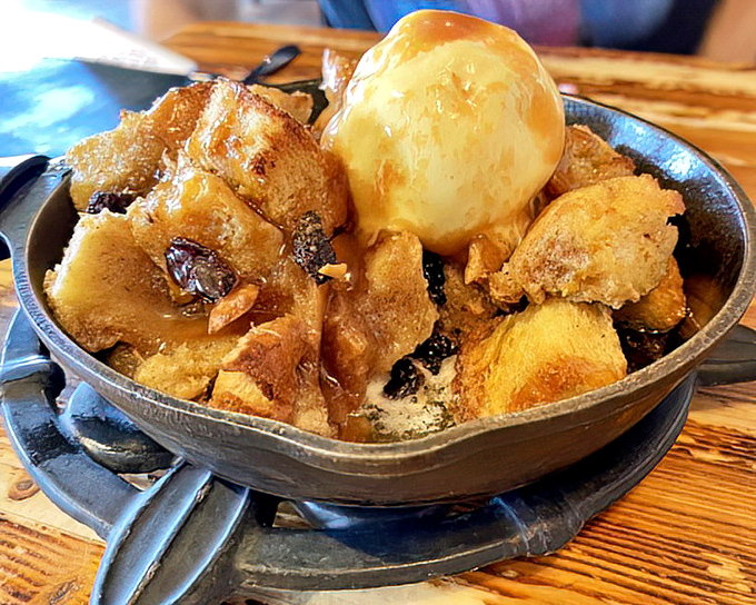 Bread pudding that could make your grandmother jealous. That scoop of ice cream slowly melting into warm, caramelized bread is pure dessert drama.