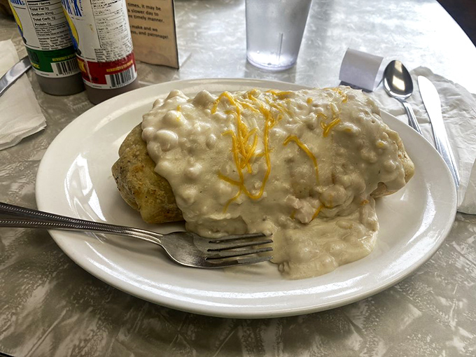 Behold the breakfast burrito&mdash;smothered in gravy and challenging the very laws of physics. Your diet plan's arch-nemesis has arrived.