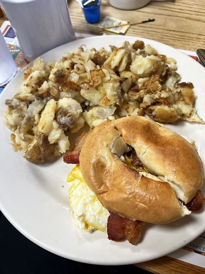 The breakfast sandwich and home fries &ndash; proof that sometimes the simplest combinations create the most profound happiness before noon.