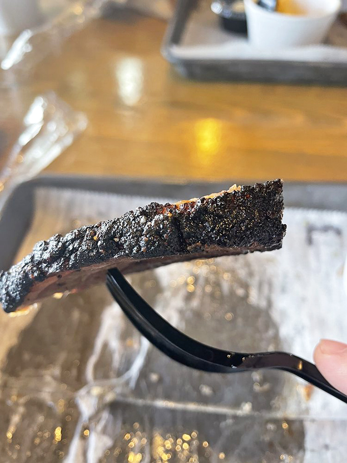 That smoke ring on the brisket isn't just for show—it's the rosy badge of honor that every pitmaster dreams of achieving.