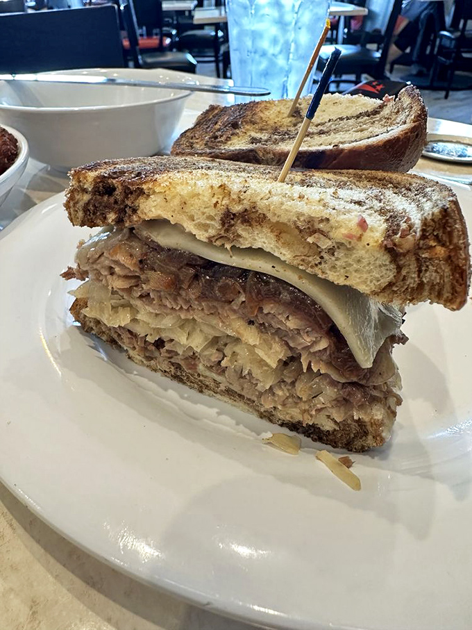 The brisket sandwich stands tall and proud, like the Statue of Liberty of lunch options—"Give me your hungry, your famished, your ravenous masses."