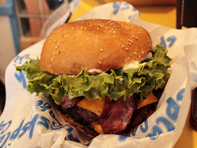 A burger that proves Splash Caf&eacute; isn't just a one-hit chowder wonder. This beauty could hold its own at any backyard barbecue championship.