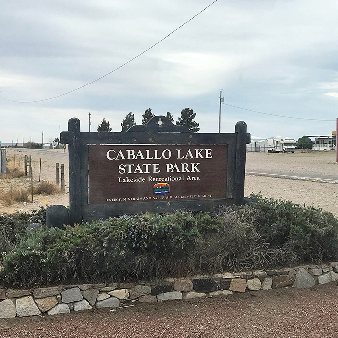 Caballo Lake State Park's sign doesn't begin to hint at the natural beauty waiting just beyond this modest entrance.