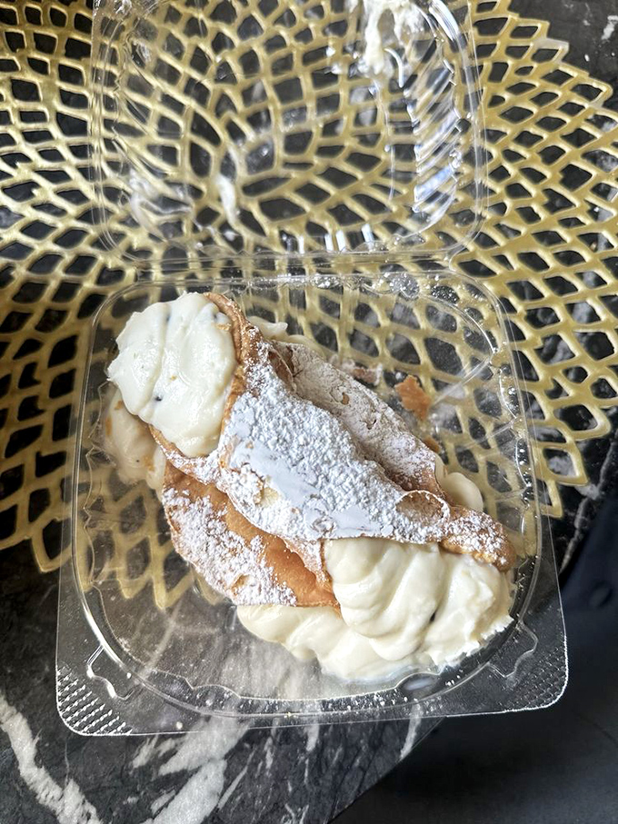 This cannoli isn't just filled&mdash;it's overstuffed like your Italian grandmother's refrigerator, cream practically winking at you from both ends.