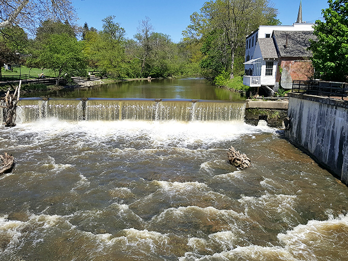The Chagrin River flows with purpose, creating a natural soundtrack that makes even the most stressed visitor exhale and think, "Maybe I'll stay awhile."