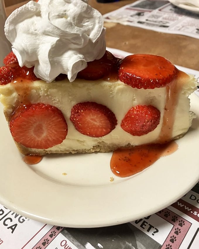 Strawberry cheesecake that doesn't just satisfy sweet cravings&mdash;it resolves them with diplomatic elegance, the whipped cream ambassador sealing the deal..