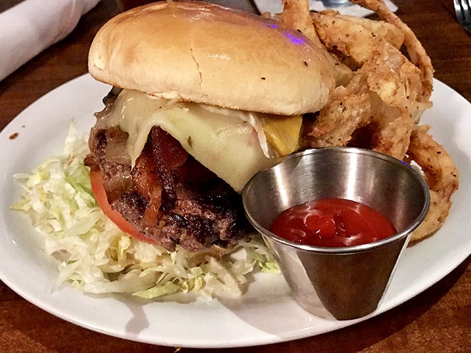 The burger-to-onion-ring ratio here is what mathematicians call "the golden ratio of deliciousness." Simple perfection on a white plate.