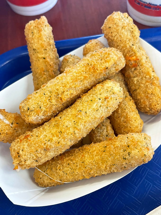 These aren't just cheese sticks&mdash;they're golden wands of happiness that transform ordinary days into celebrations with their crispy exteriors and molten centers.
