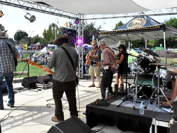 Local musicians keep Chico's community spirit alive at outdoor festivals where cowboy hats and guitar riffs blend seamlessly.
