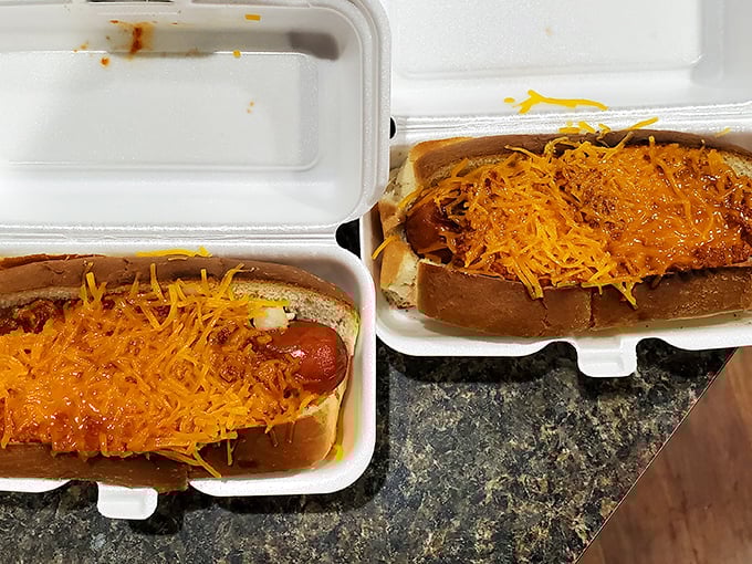 To-go containers that hold treasures more valuable than gold: perfectly assembled chili dogs with that signature cheese crown.