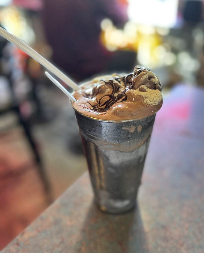 This chocolate malt isn't just dessert, it's a time machine &ndash; one spoonful and suddenly you're twelve years old again, plotting how to finish homework faster.