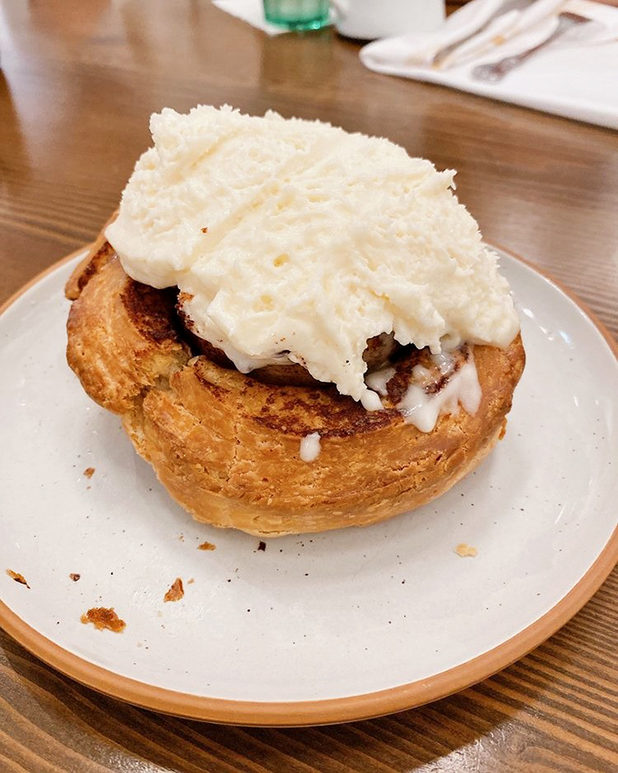 This isn't just a cinnamon roll&mdash;it's a cloud of pastry perfection with a snowcap of cream cheese that makes Monday mornings bearable again.