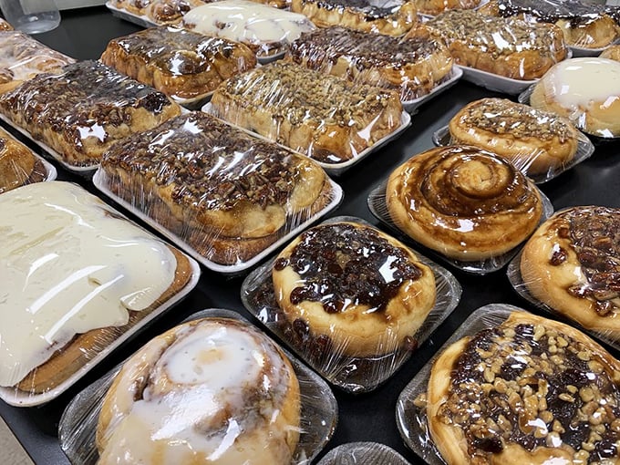 Cinnamon rolls that could make a cardiologist weep—with both concern and desire. These spiral-shaped treasures are architecture you can eat.