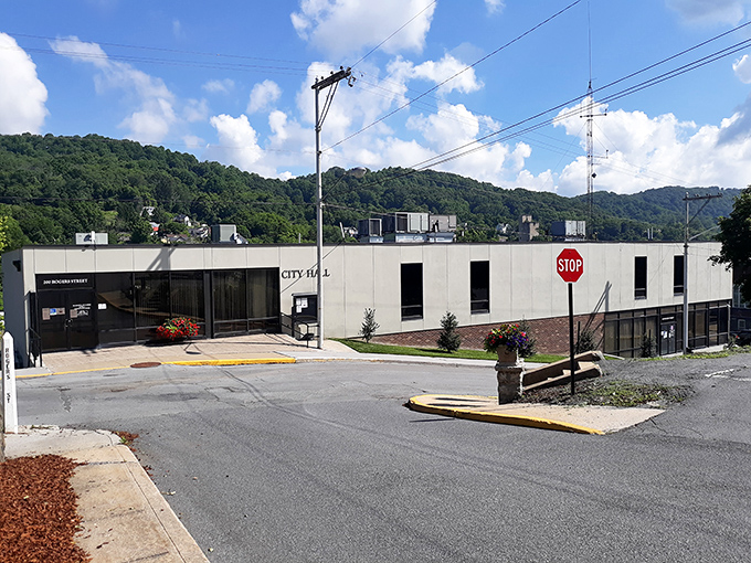 Bluefield's modernist City Hall stands against a backdrop of lush mountains, representing efficient government without big-city tax rates.