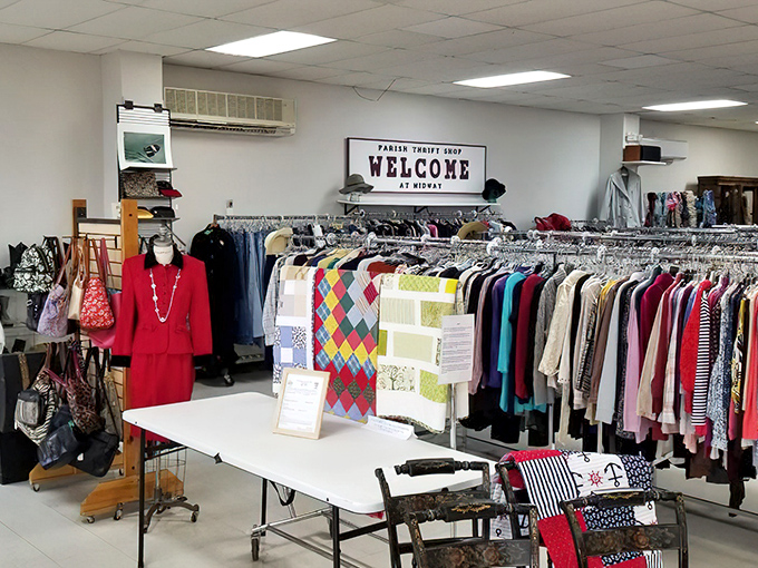 The clothing section stretches like a textile rainbow, where yesterday's fashion statements await their chance to become tomorrow's vintage treasures.