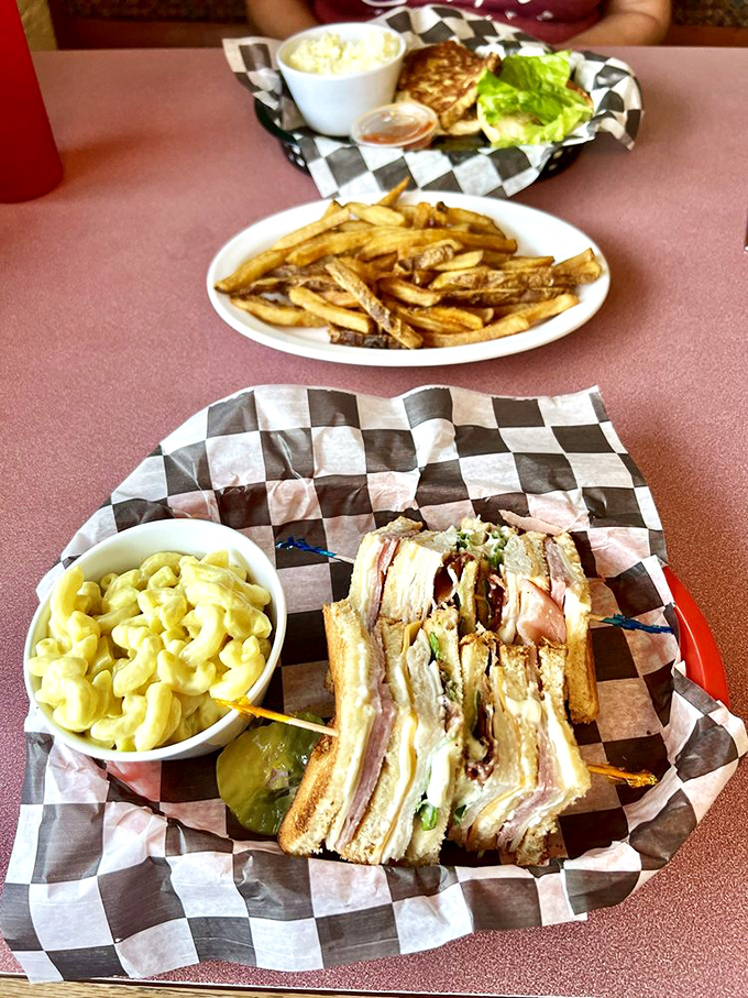 The club sandwich&mdash;architecture you can eat. Paired with mac and cheese that would make your childhood self high-five your adult self.