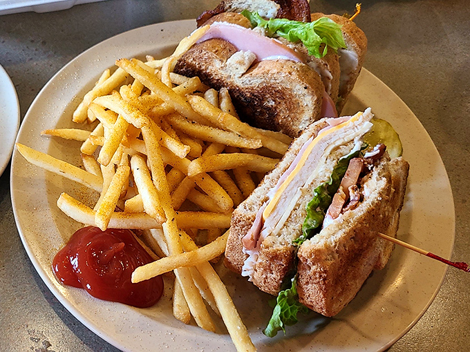 The club sandwich&mdash;that architectural marvel of bread, meat, and vegetables that somehow tastes better when cut into triangles and served with a pickle.
