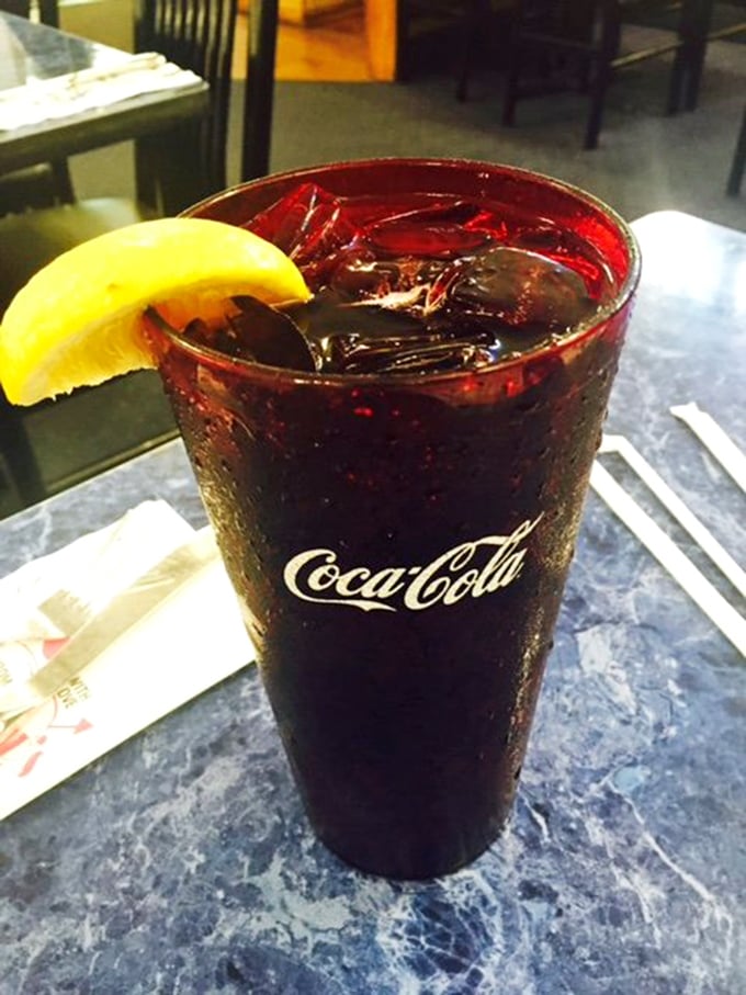 Even the beverages at Harold's come supersized. This Coca-Cola isn't just a drink&mdash;it's a commitment to hydration that could last through a double feature.