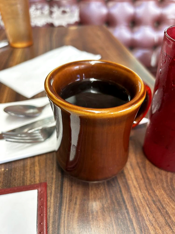The humble brown coffee mug&mdash;delivering liquid motivation since forever. At Rae's, it's not just coffee; it's a commitment to keeping the refills coming.