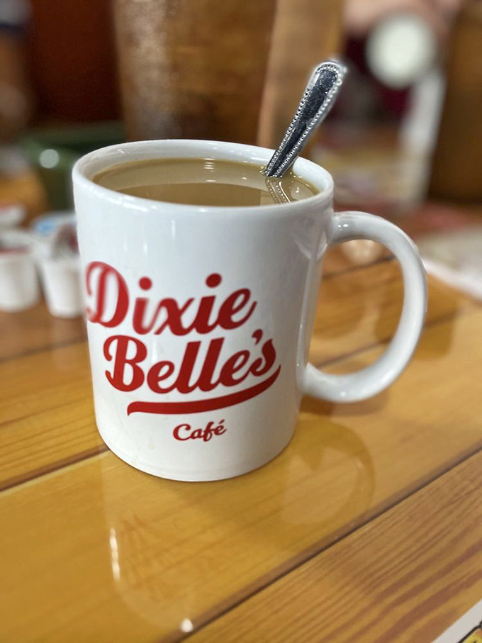 The humble coffee mug&mdash;trusty companion to every great breakfast adventure. This isn't just caffeine; it's liquid motivation in Dixie Belle's signature red.