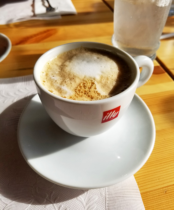 Even their coffee cups look happy to be here. This isn't just caffeine, it's liquid motivation served in Italian porcelain.