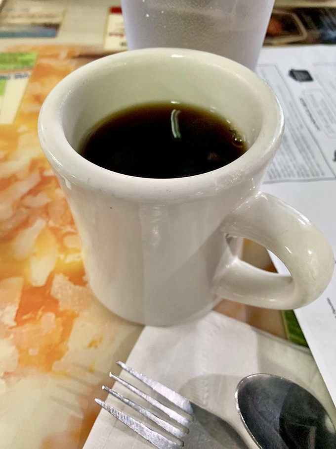 The humble diner coffee mug &ndash; holding the life-giving elixir that transforms morning zombies into functioning humans since time immemorial.