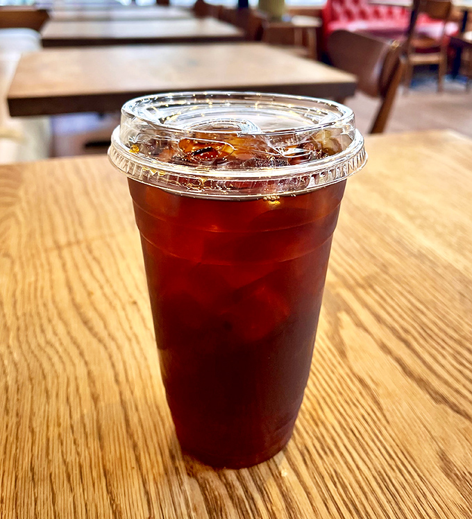 Cold brew coffee so rich it deserves its own tax bracket. Sitting there in amber perfection, promising alertness and joy in equal measure.