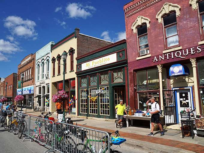 Cyclists and pedestrians enjoy Winterset's vibrant commercial district, where antique shops and cafes offer treasures both old and new.