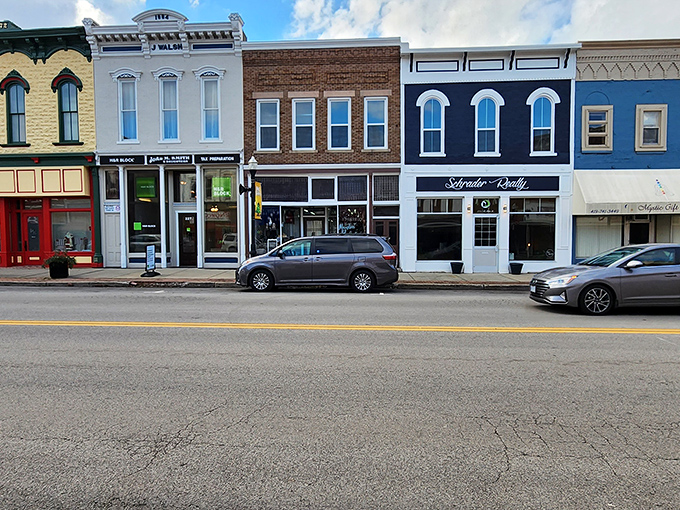 A painter's palette of storefronts showcasing the architectural equivalent of a well-coordinated outfit&mdash;different styles that somehow work perfectly together.